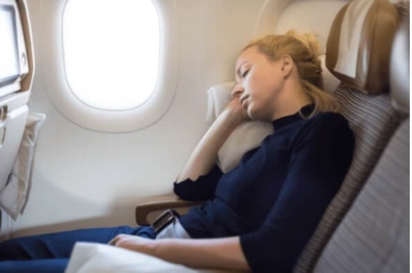 21 Sleeping On A Plane Hacks: Rest Easy During Your Flight